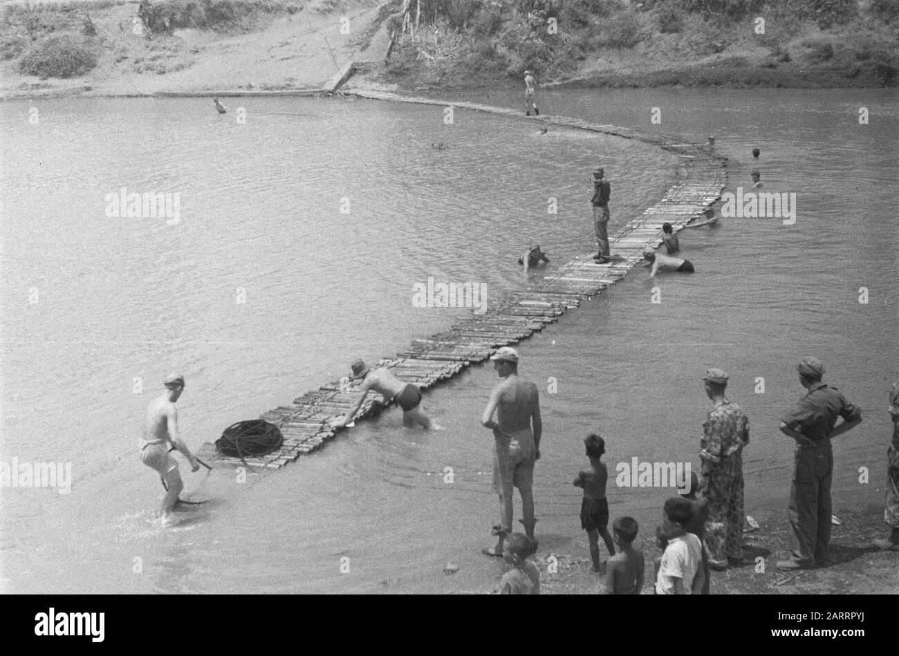 Laying of a bamboo bridge Footbridges for infantry. Many bridges have ...