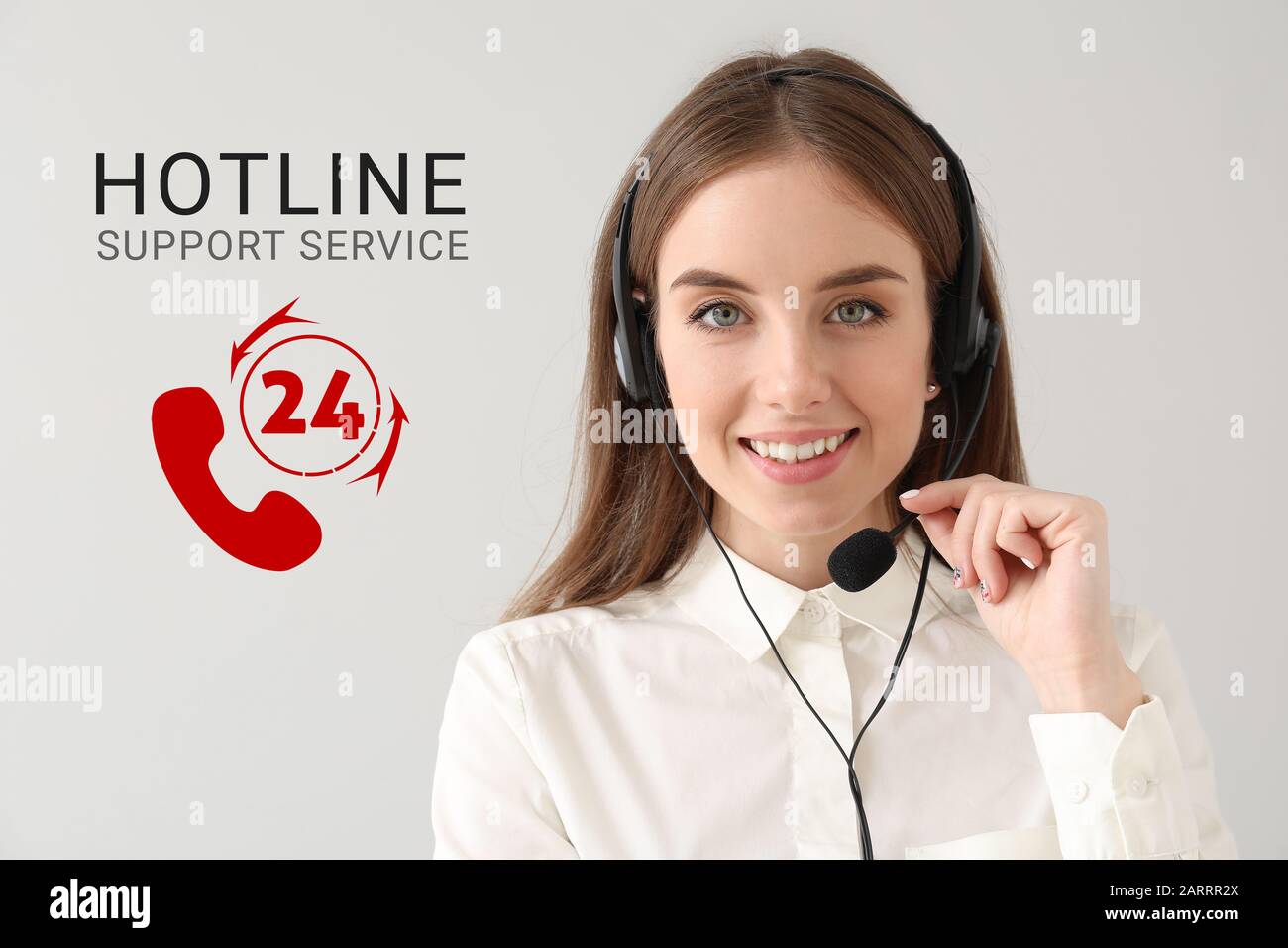 Female technical support agent on light background Stock Photo - Alamy