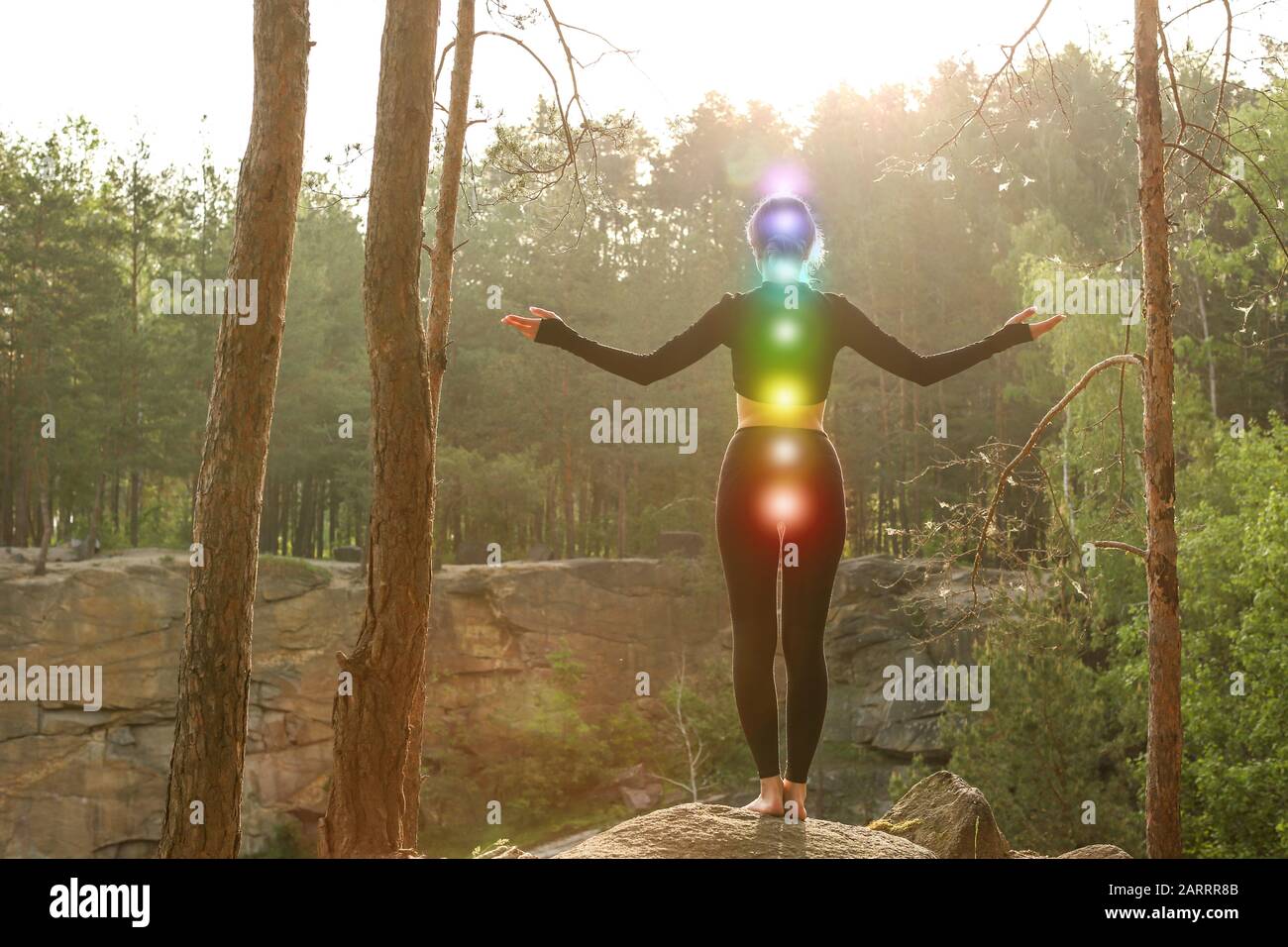 Woman aura chakras in meditation hi-res stock photography and images ...