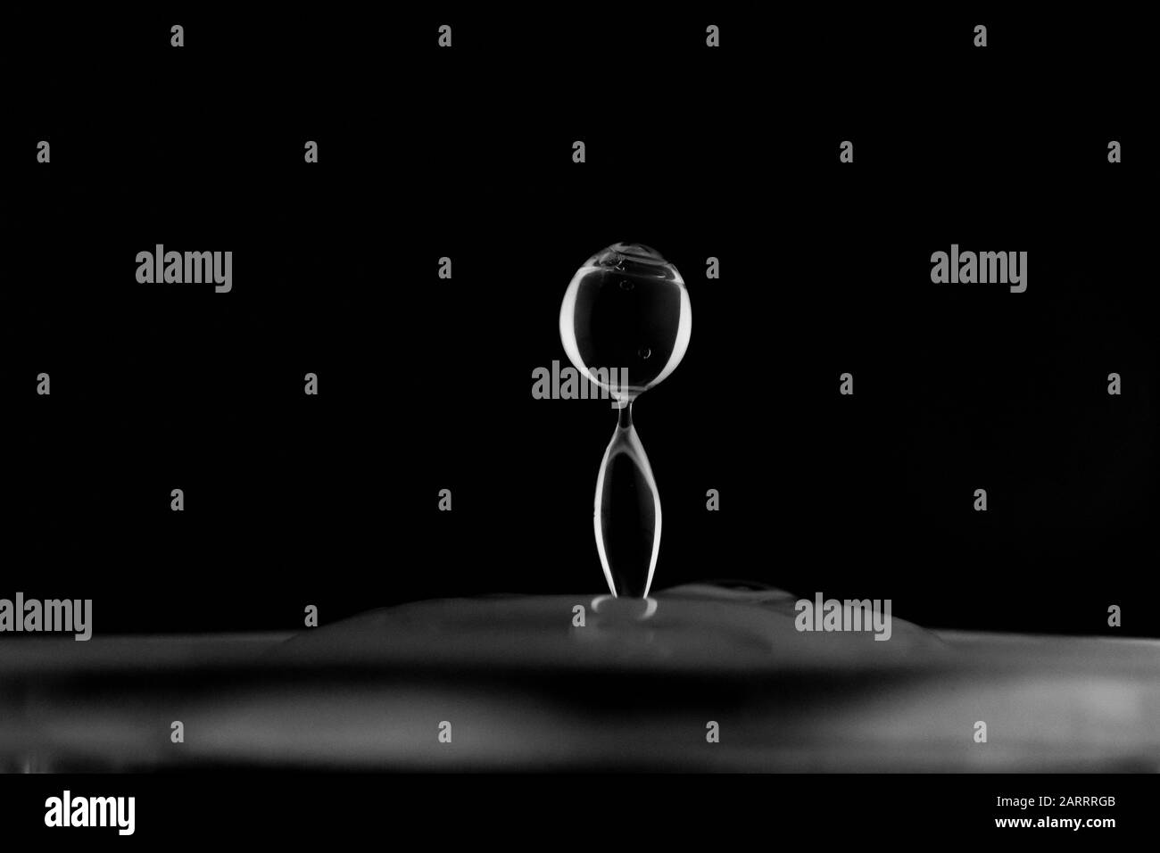 Water splash isolated, water drop hit the surface, water droplet ...