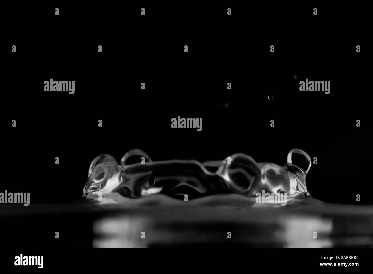 Water splash isolated, water drop hit the surface, water droplet ...