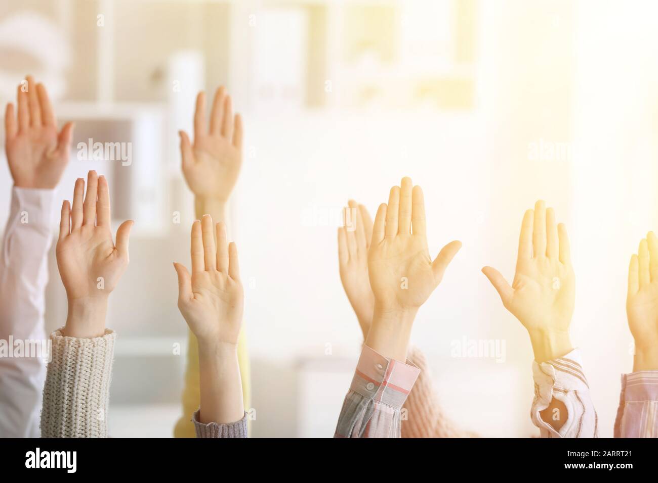 Hands raised in voting hi-res stock photography and images - Alamy