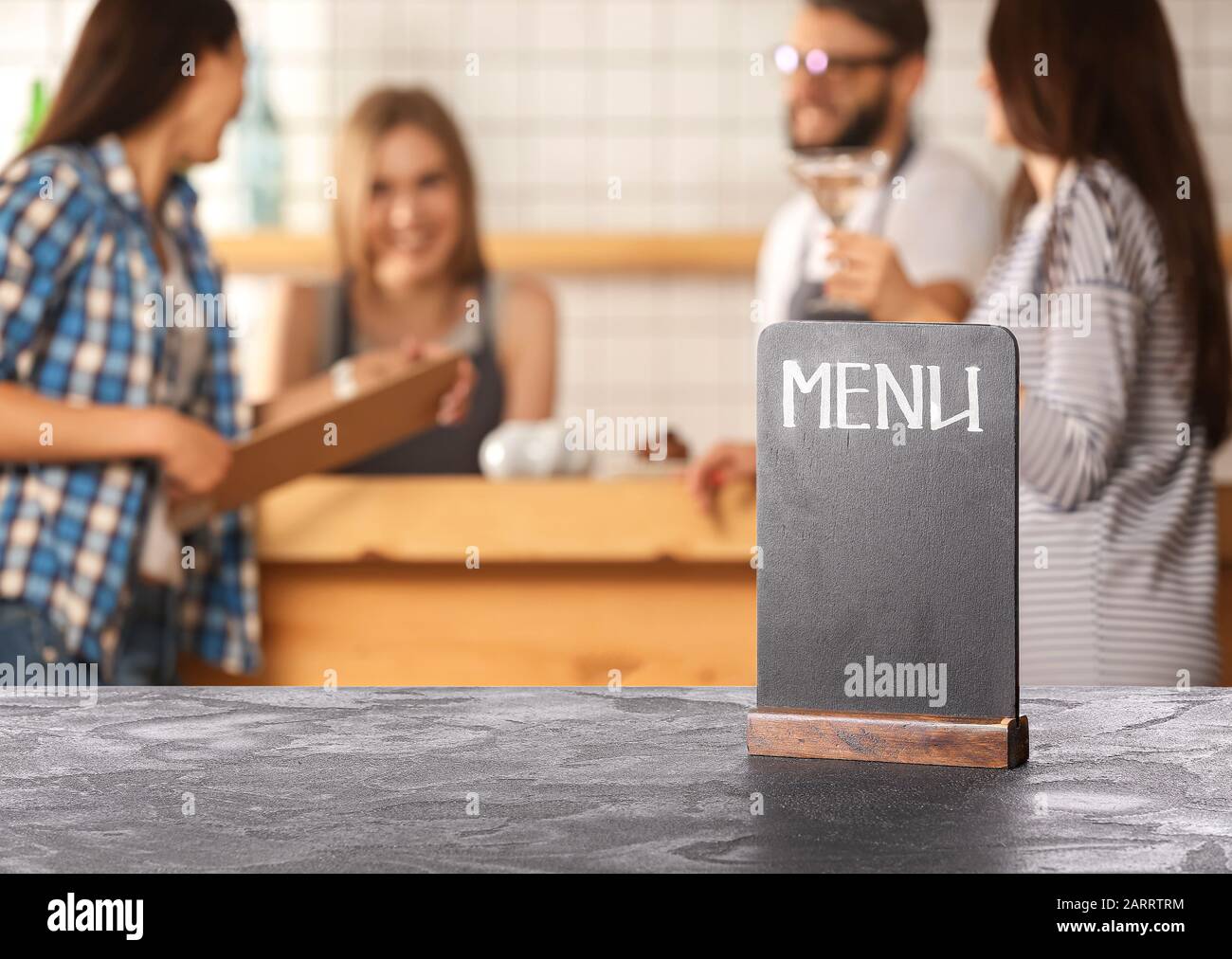 Blank menu on table in bar Stock Photo - Alamy