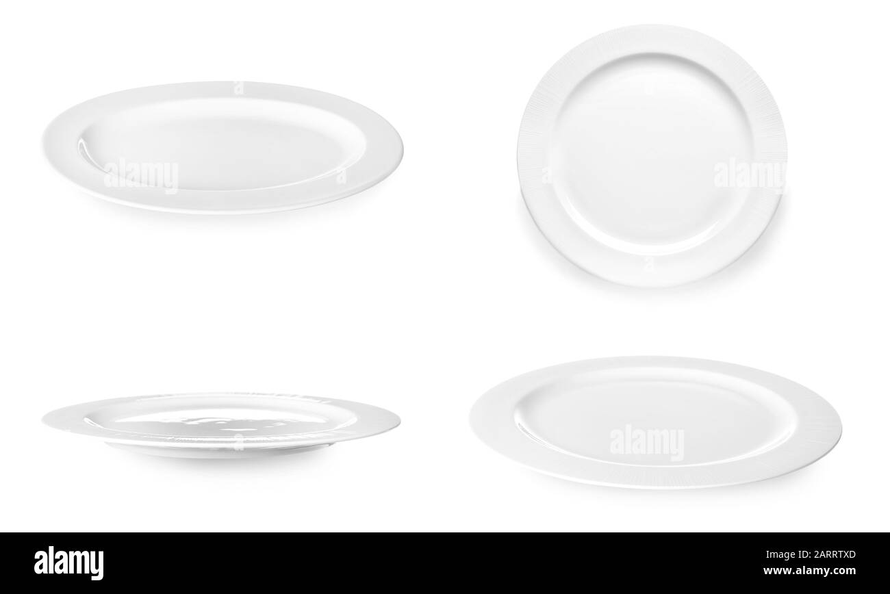 Set of empty ceramic plates on white background Stock Photo - Alamy