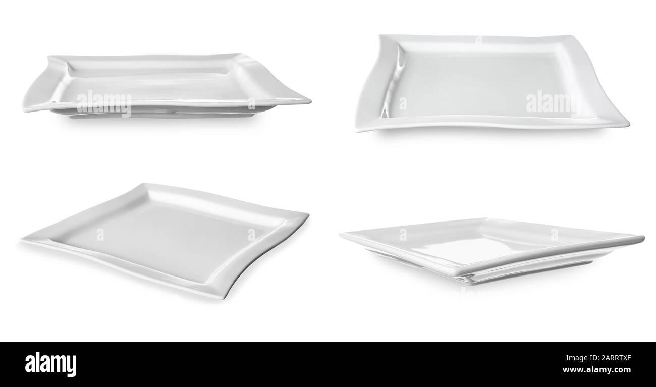 Set of empty ceramic plates on white background Stock Photo - Alamy