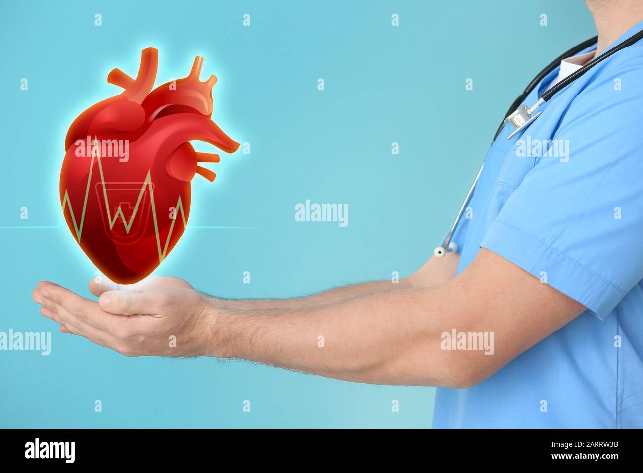 Male cardiologist with drawn heart on color background Stock Photo - Alamy