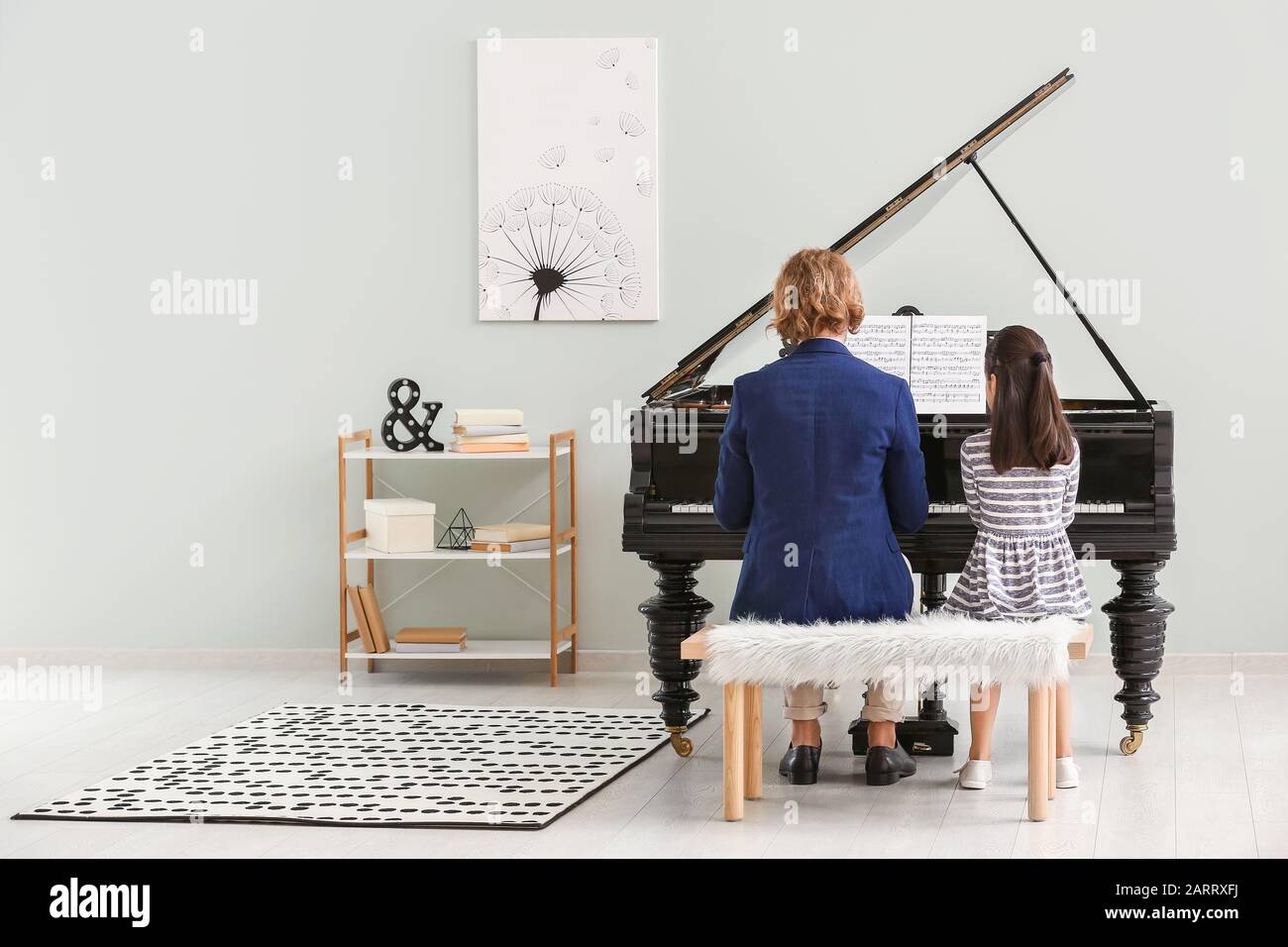 Person Playing Piano Back View