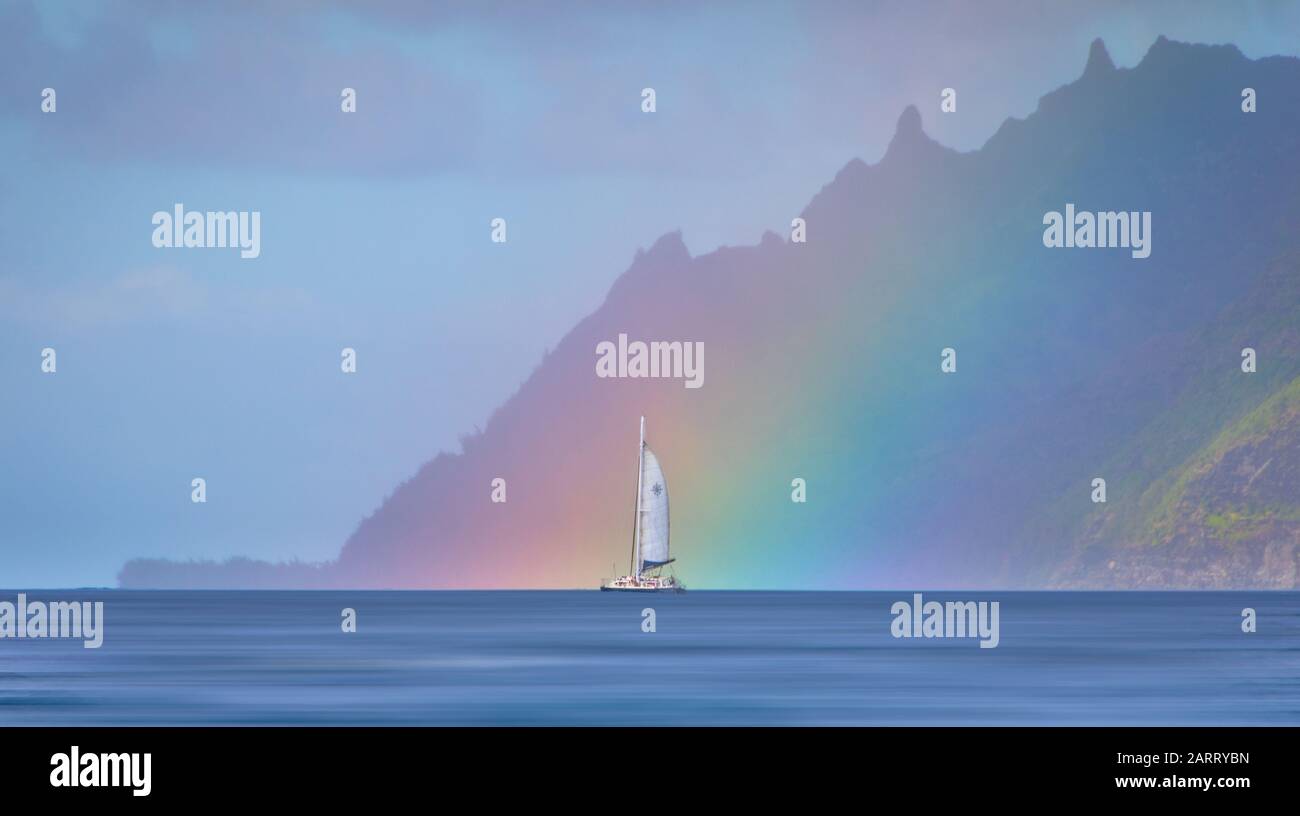 Sail boat Na Pali coast rainbow Stock Photo - Alamy