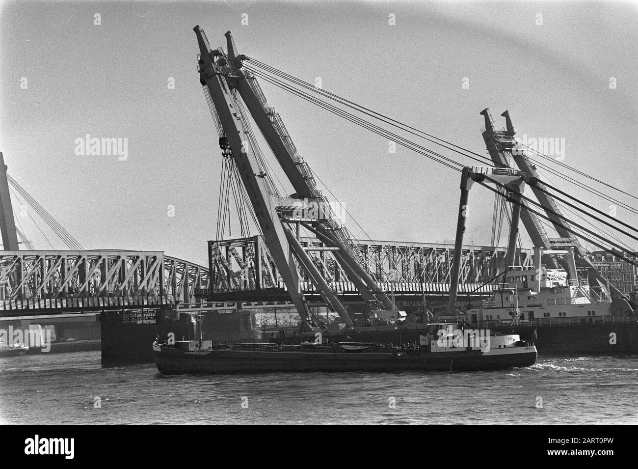 Demolition old Willemsbrug in Rotterdam started. With two floating ...
