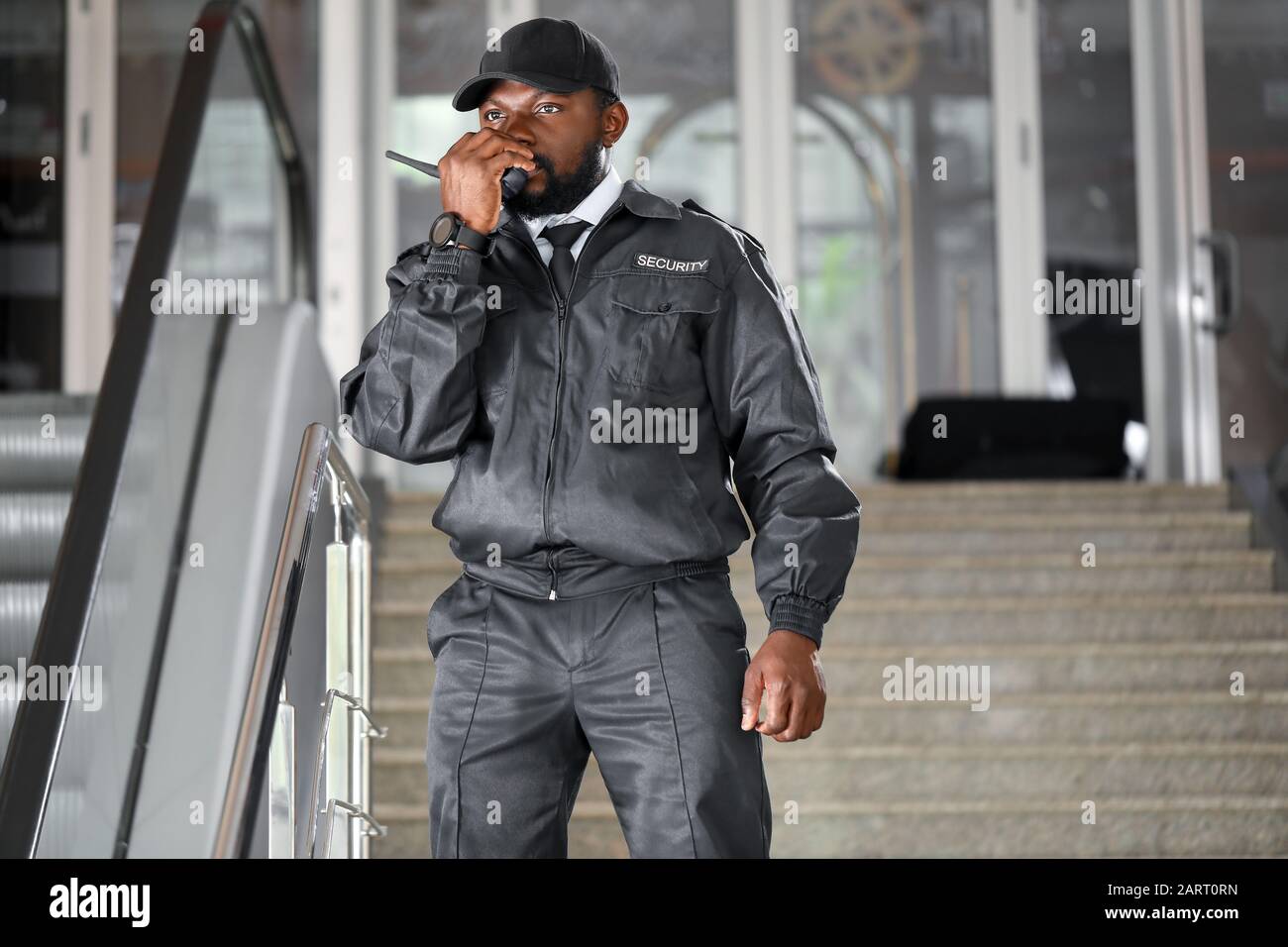 African-American security guard working in building Stock Photo - Alamy