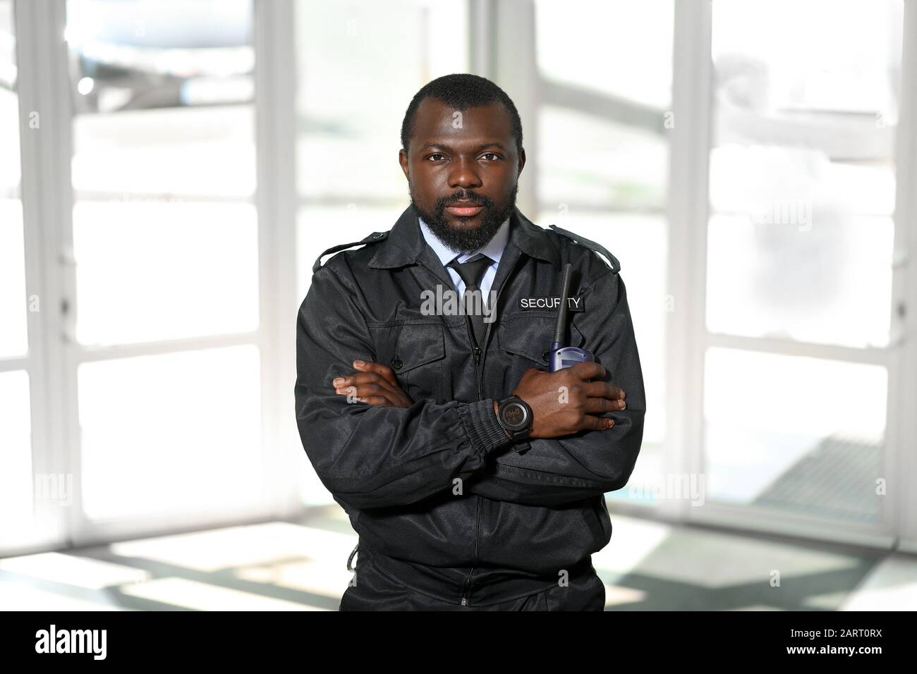 African-American security guard in building Stock Photo - Alamy
