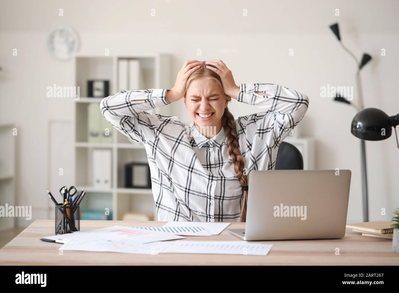 Portrait of angry woman in office Stock Photo - Alamy