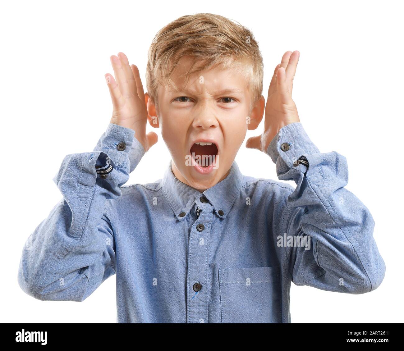 Portrait of angry little boy on white background Stock Photo - Alamy