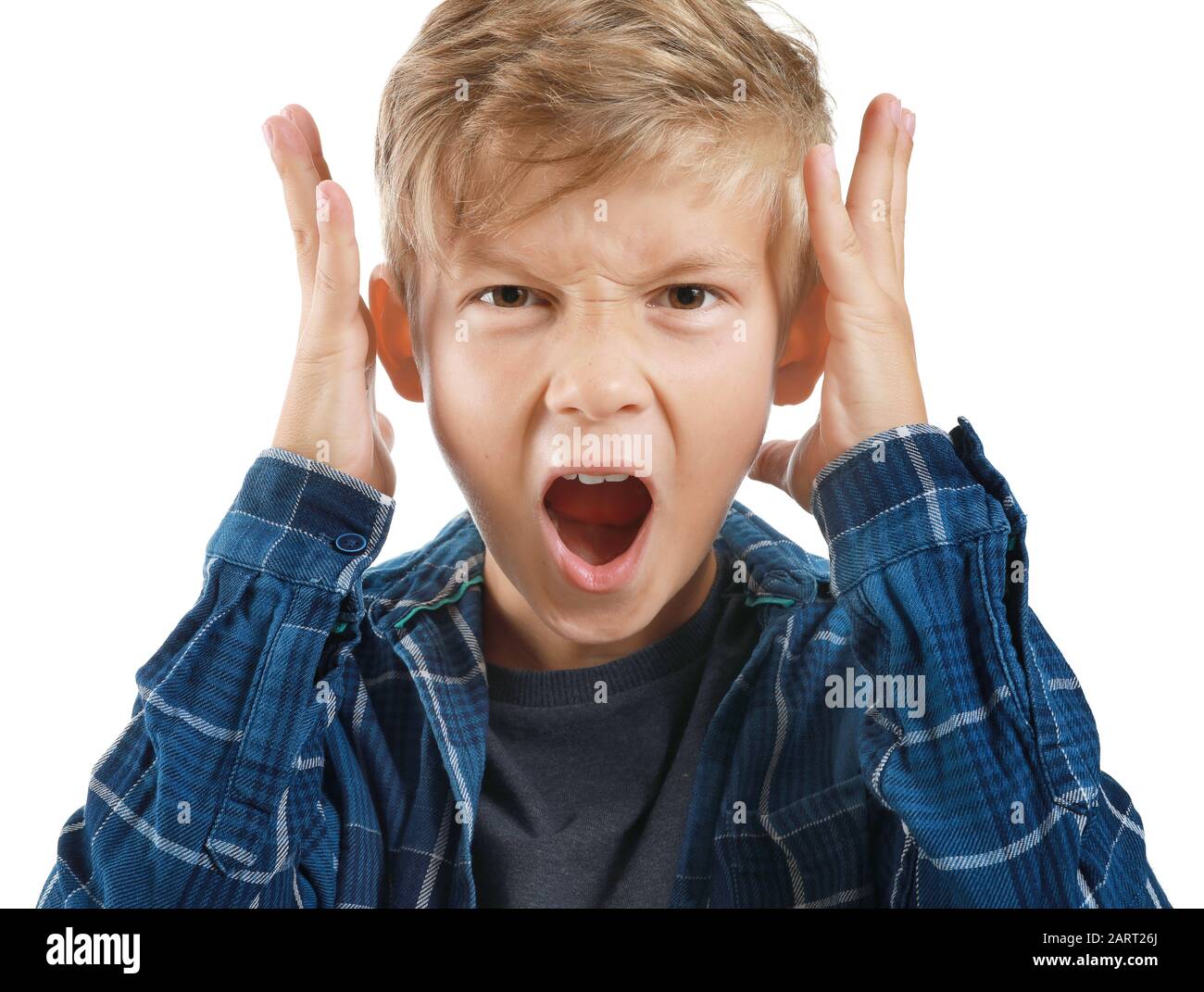Portrait of angry little boy on white background Stock Photo - Alamy