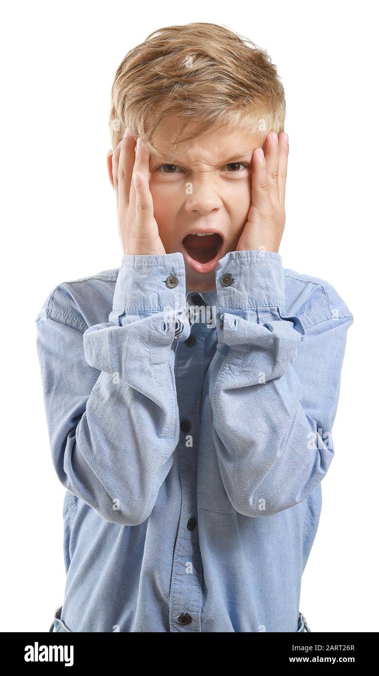 Portrait of angry little boy on white background Stock Photo - Alamy
