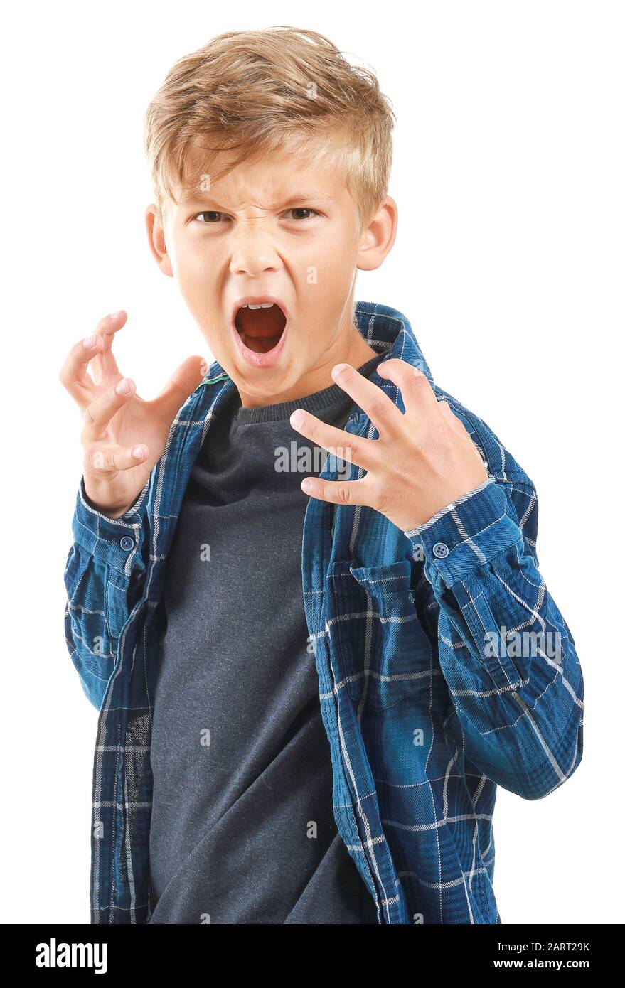 Portrait of angry little boy on white background Stock Photo - Alamy