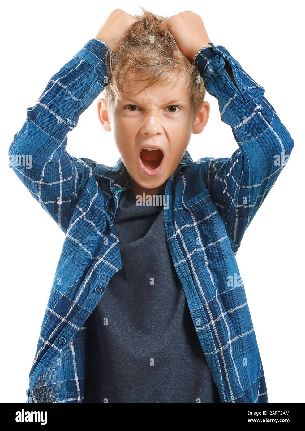 Portrait of angry little boy on white background Stock Photo - Alamy