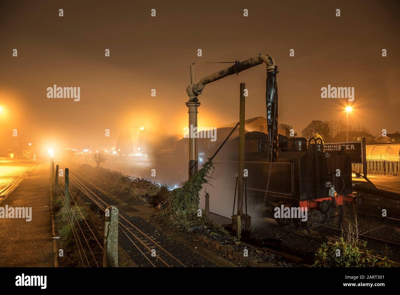 Atmospheric close up of vintage UK steam locomotive isolated at water ...