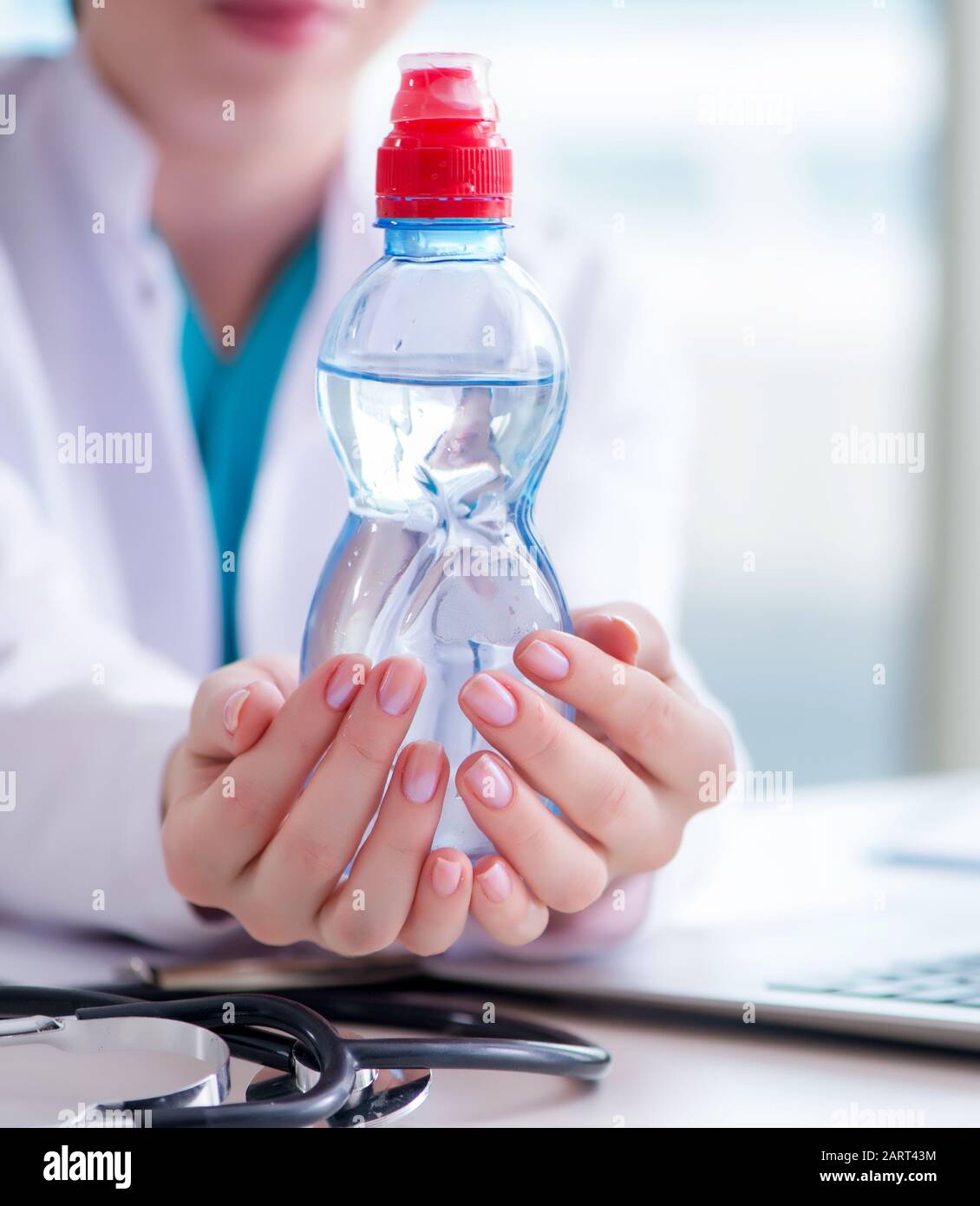 The doctor hand with fresh water in medical concept Stock Photo - Alamy