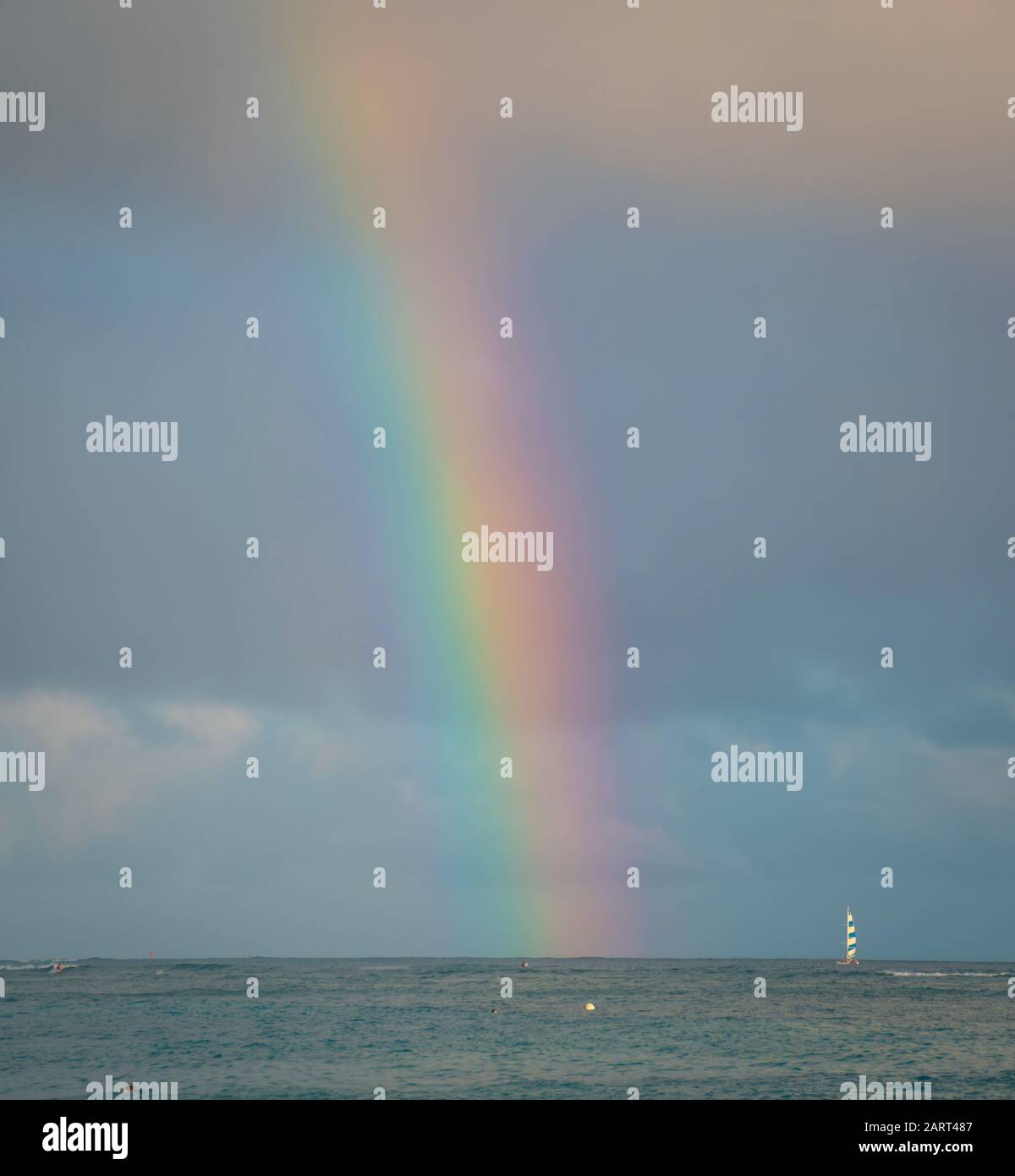 Rainbow over ocean Stock Photo - Alamy