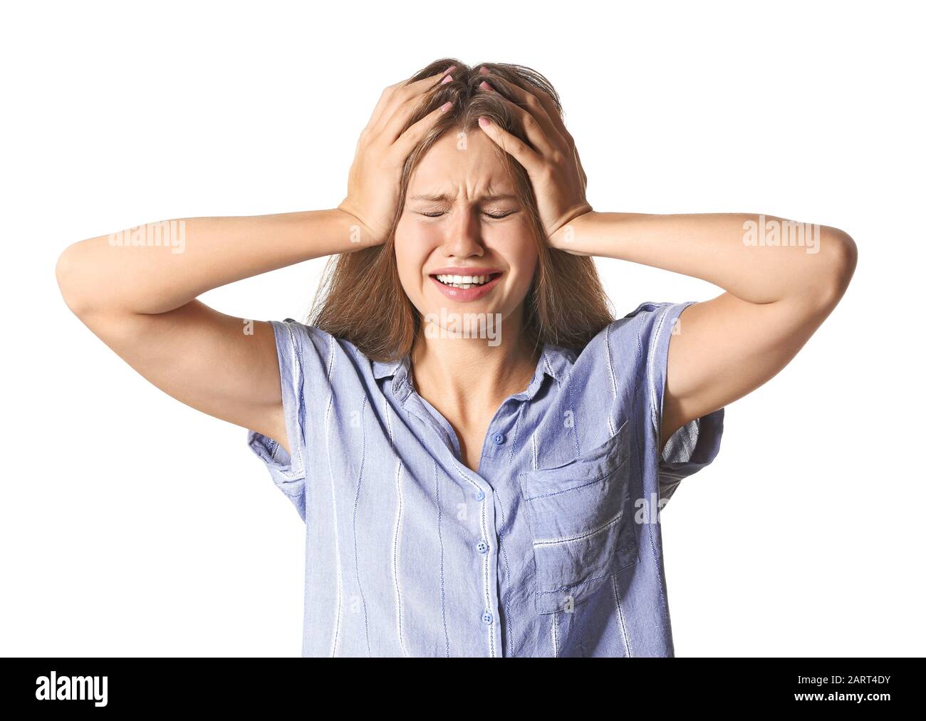 Stressed young woman on white background Stock Photo - Alamy