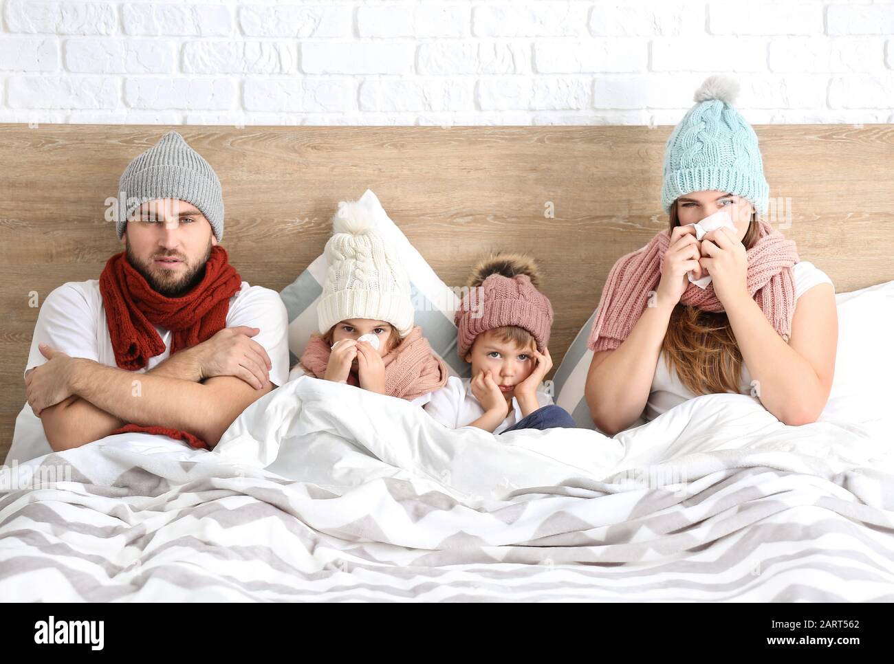 Family ill with flu in bed at home Stock Photo - Alamy