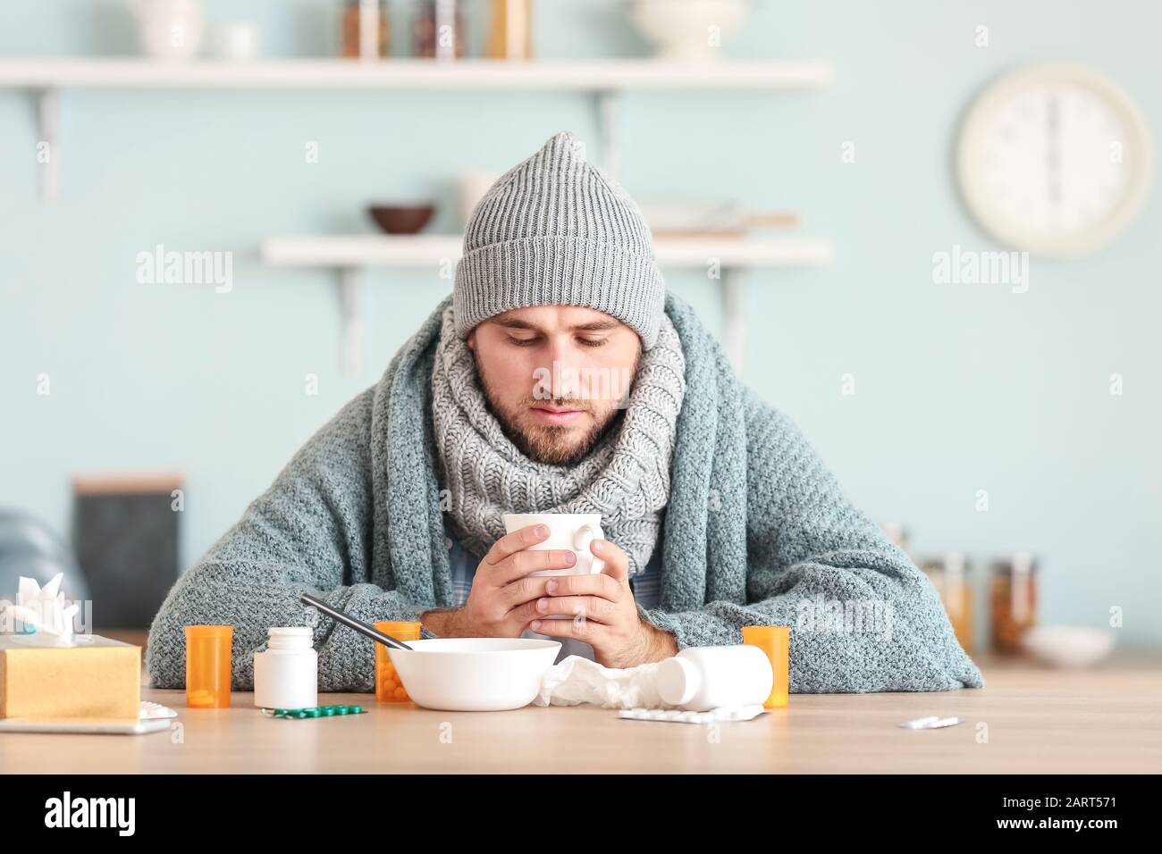 Sick man with chicken soup hi-res stock photography and images - Alamy