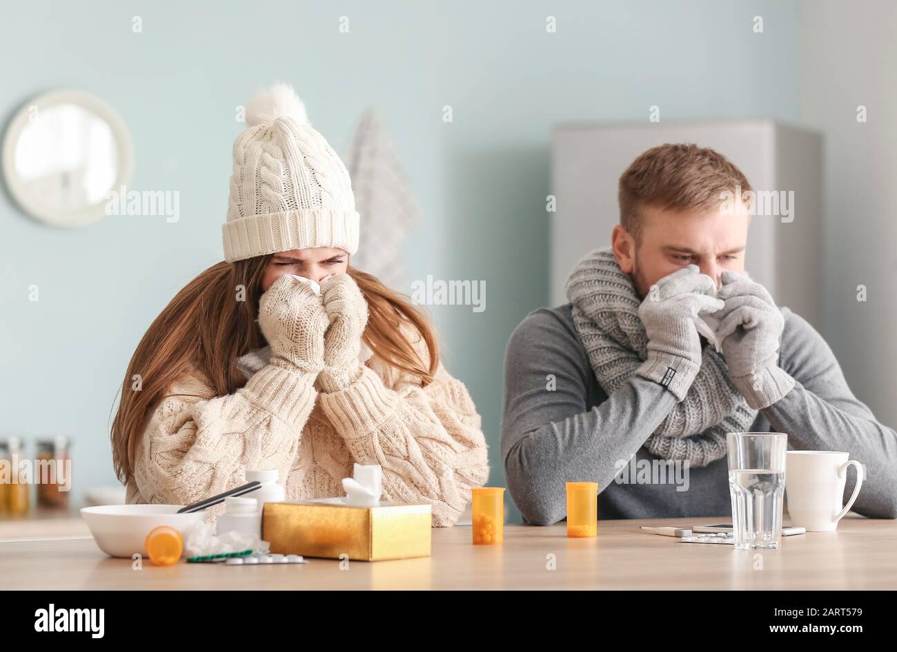 Sick woman in kitchen blowing hi-res stock photography and images - Alamy