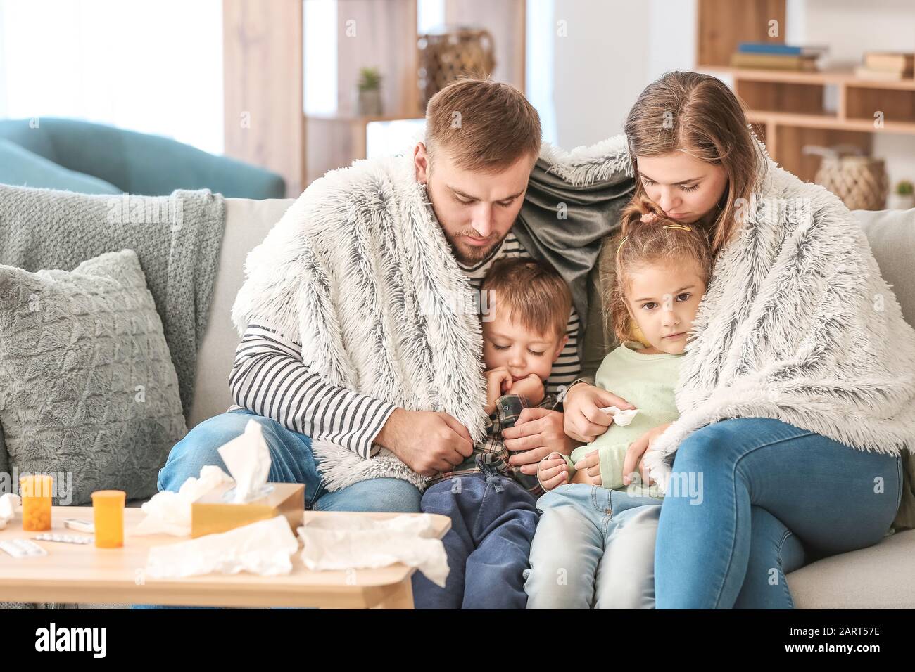 Family ill with flu at home Stock Photo - Alamy