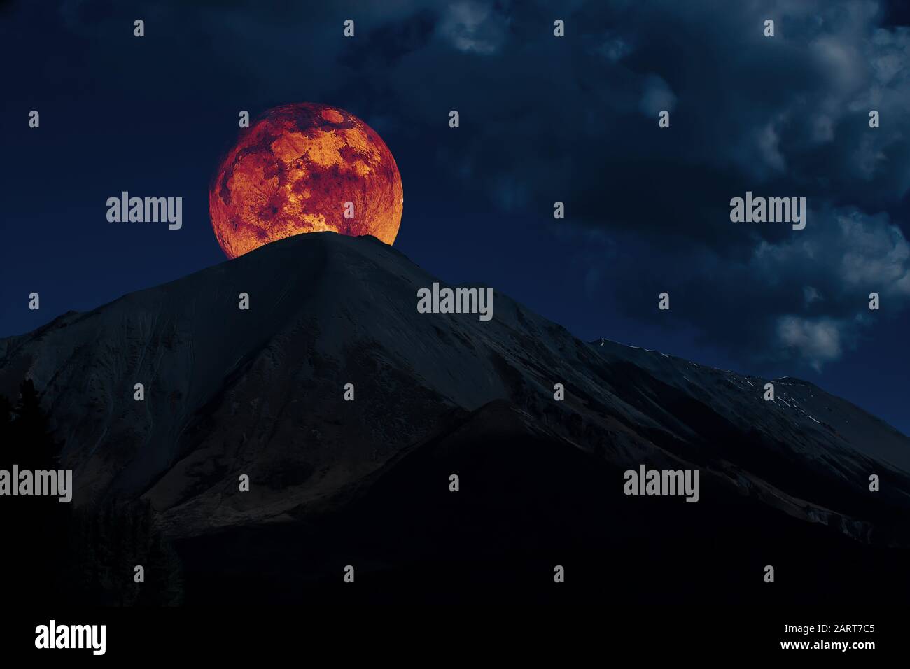Science fiction Moon rise over mountains Stock Photo - Alamy