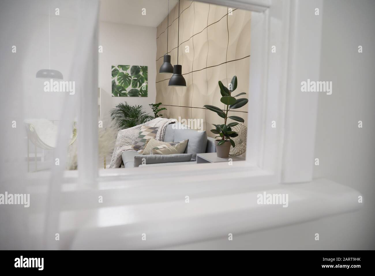 View through window on living room Stock Photo - Alamy