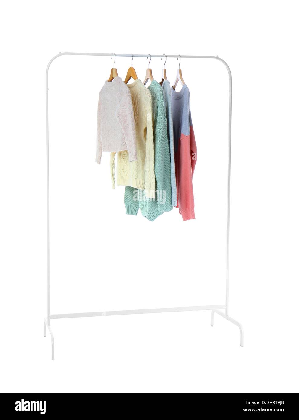 Rack with hanging clothes on white background Stock Photo - Alamy