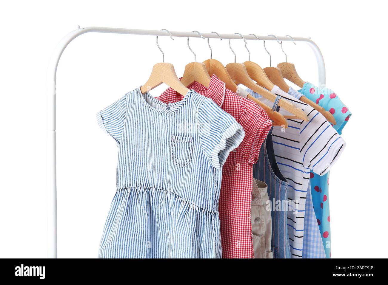 Rack with hanging clothes on white background Stock Photo - Alamy