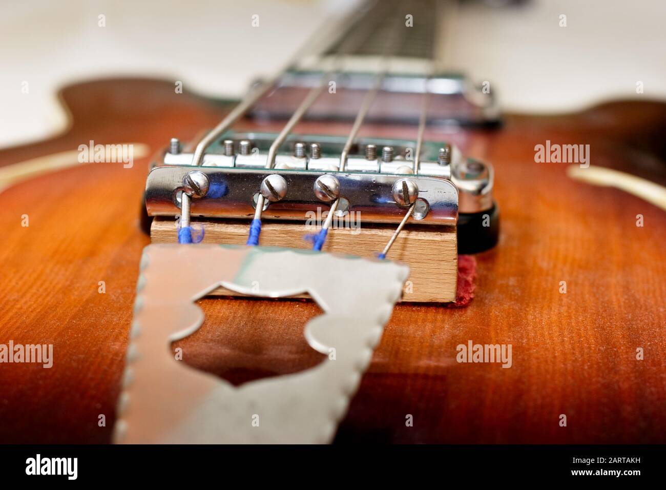 Old bass guitar close-up, shallow depth of field Stock Photo - Alamy