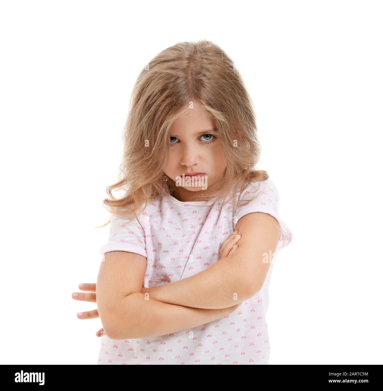 Offended little girl on white background Stock Photo - Alamy