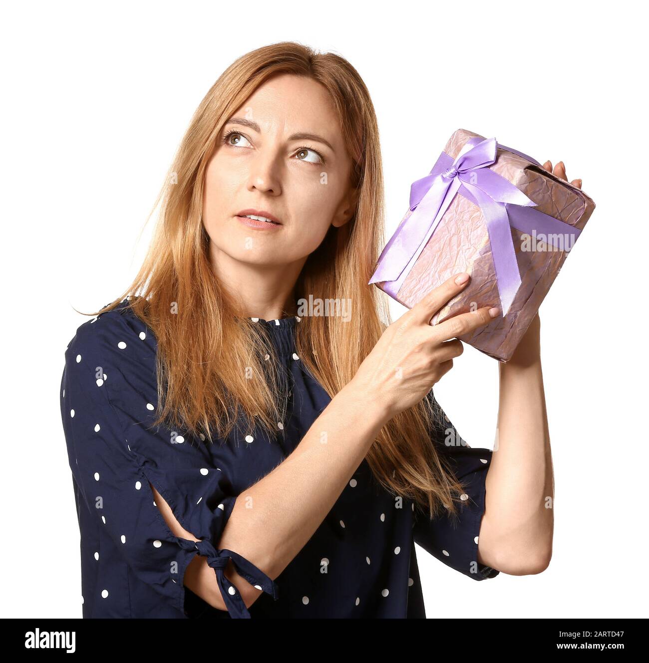 Beautiful woman with gift on white background Stock Photo - Alamy