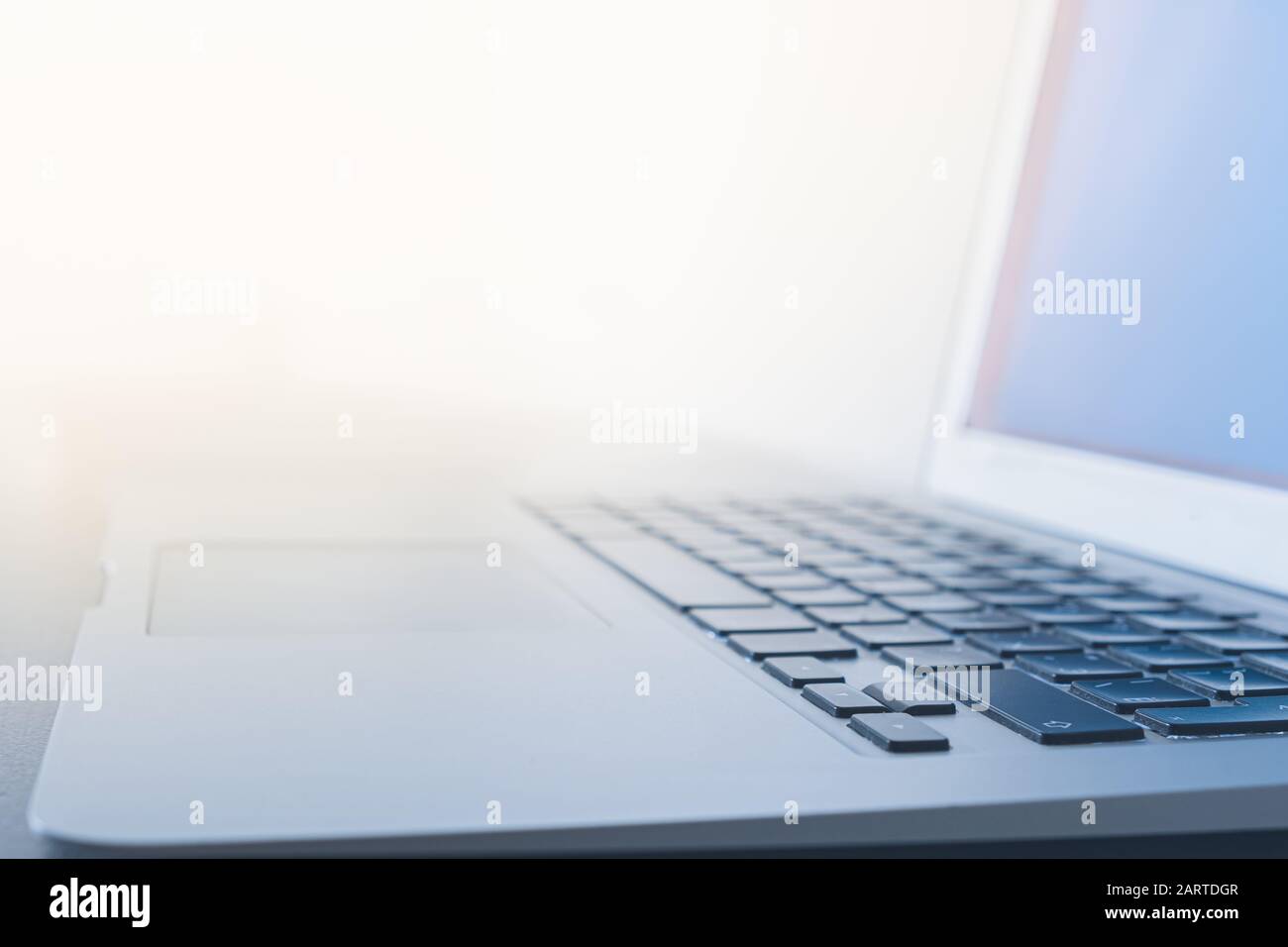 Surface of a portable computer against the bright light. Concept of ...