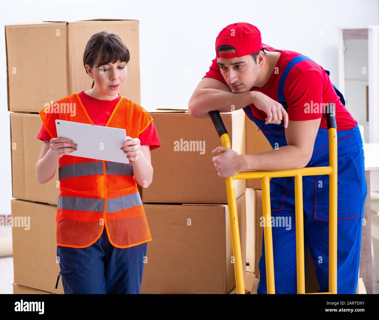 The professional movers doing home relocation Stock Photo - Alamy