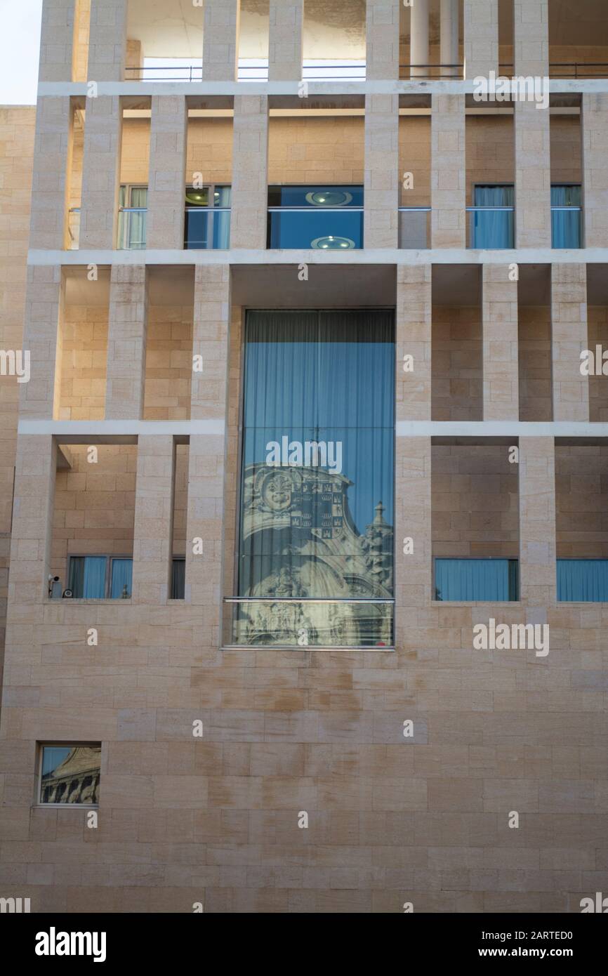 Murcia Cathedral reflected in the windows of the Edificio Moneo in ...