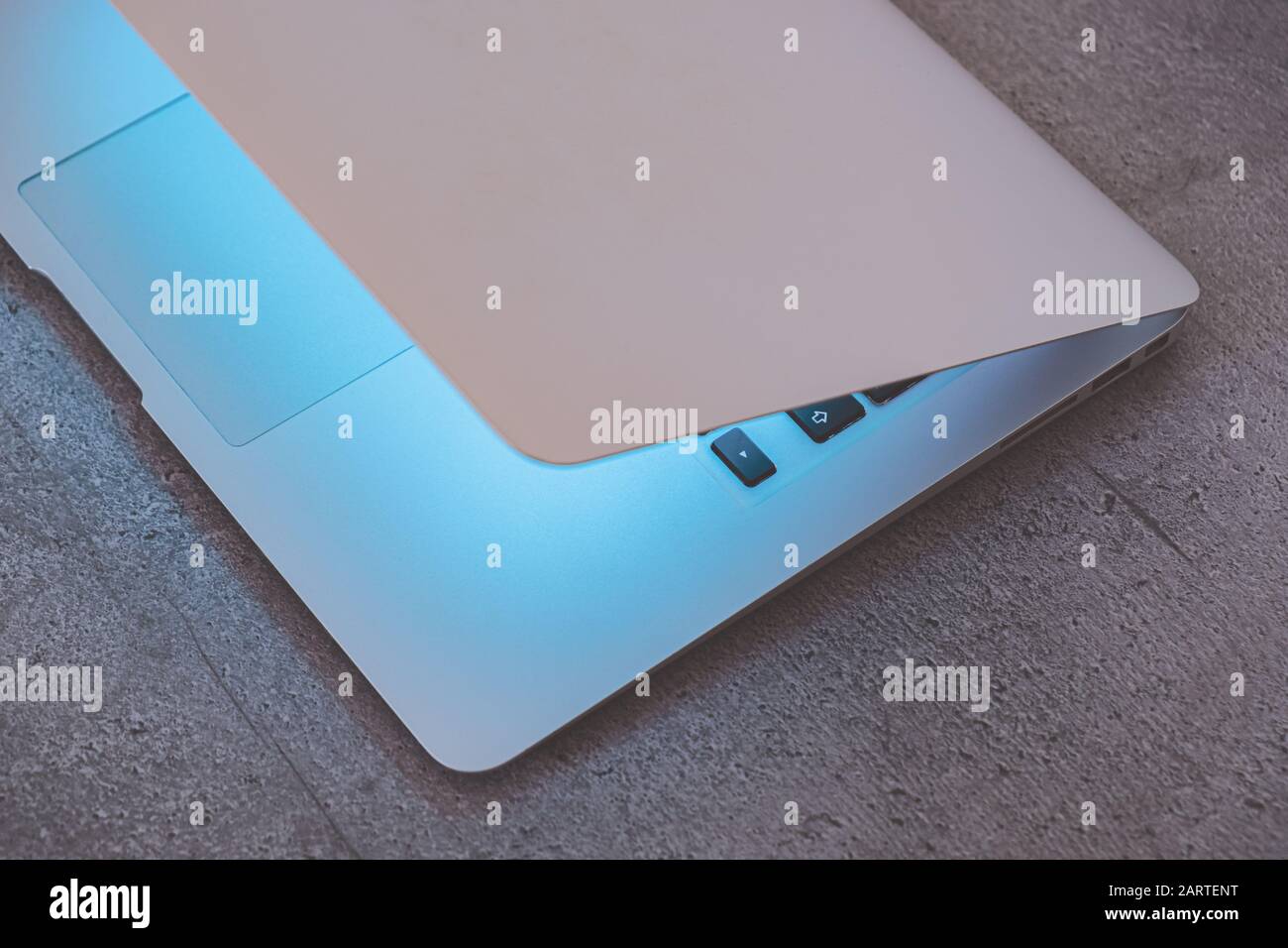 Top view of a laptop with closed lid on an office table. Concept of ...