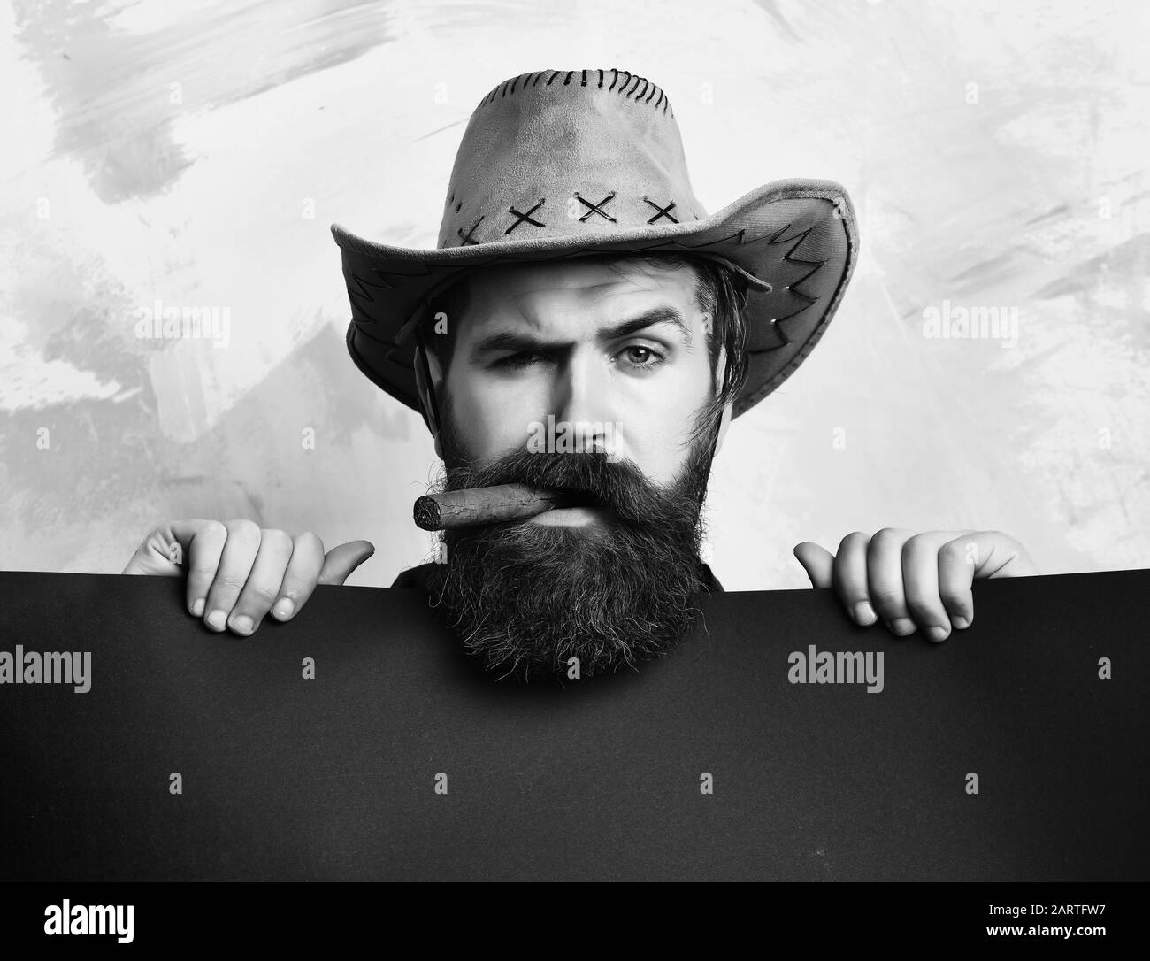 Handsome guy smoking cigar Black and White Stock Photos & Images - Alamy