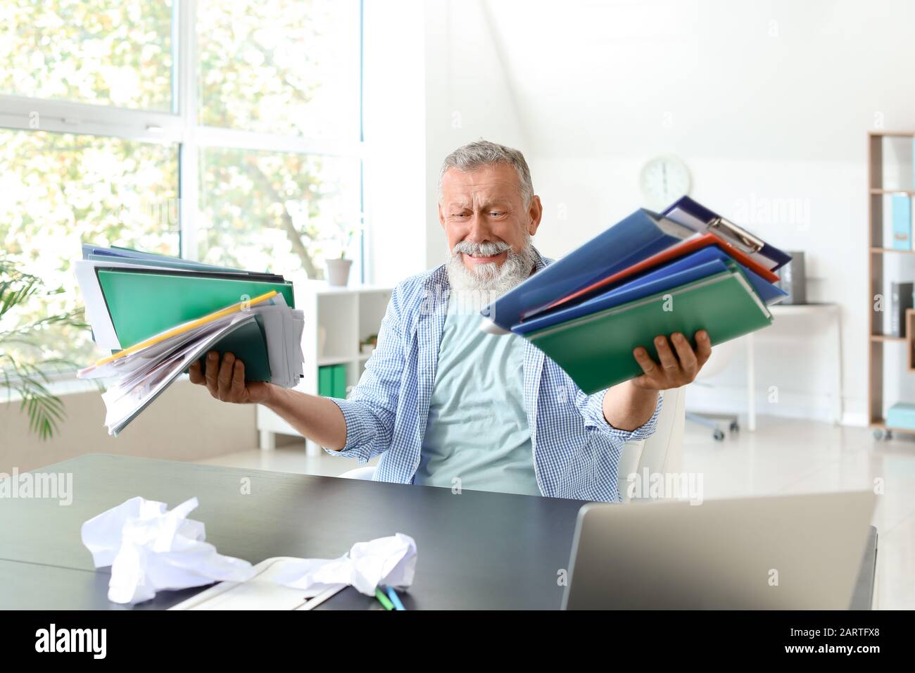 Disturbed man in table hi-res stock photography and images - Alamy