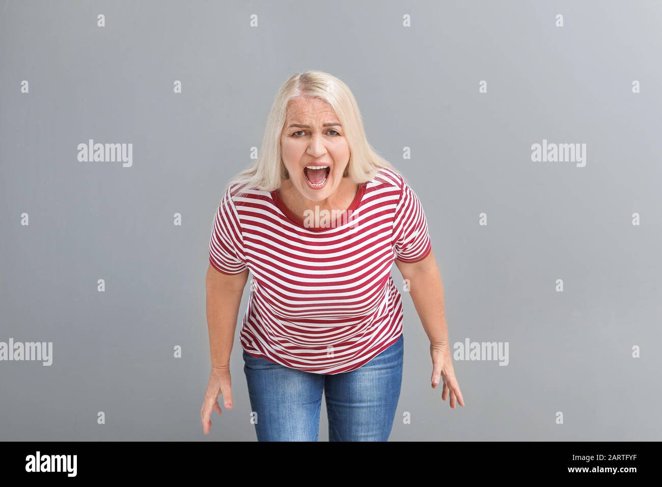 Angry senior woman screaming hi-res stock photography and images - Alamy