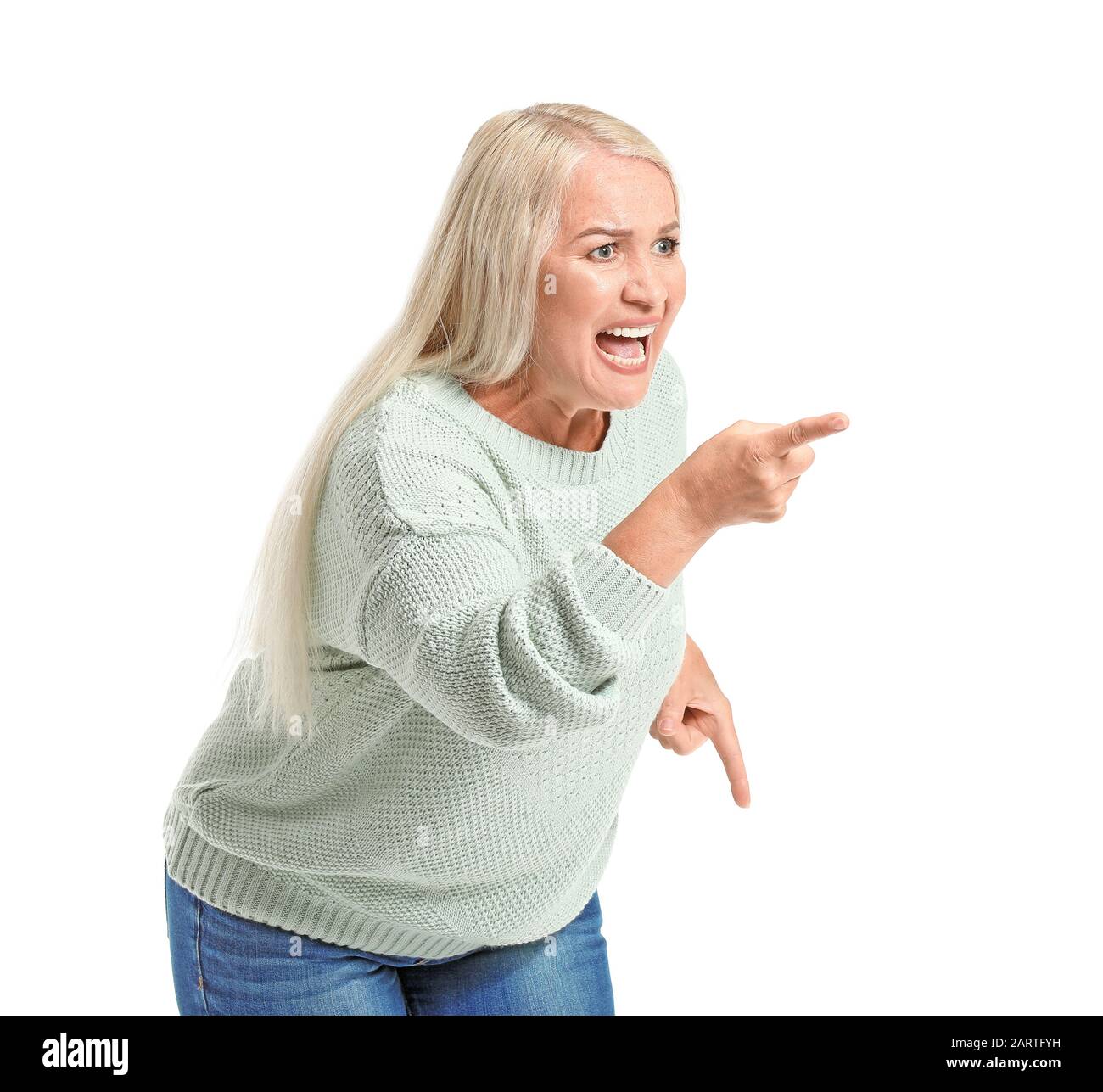 Angry mature woman on white background Stock Photo - Alamy