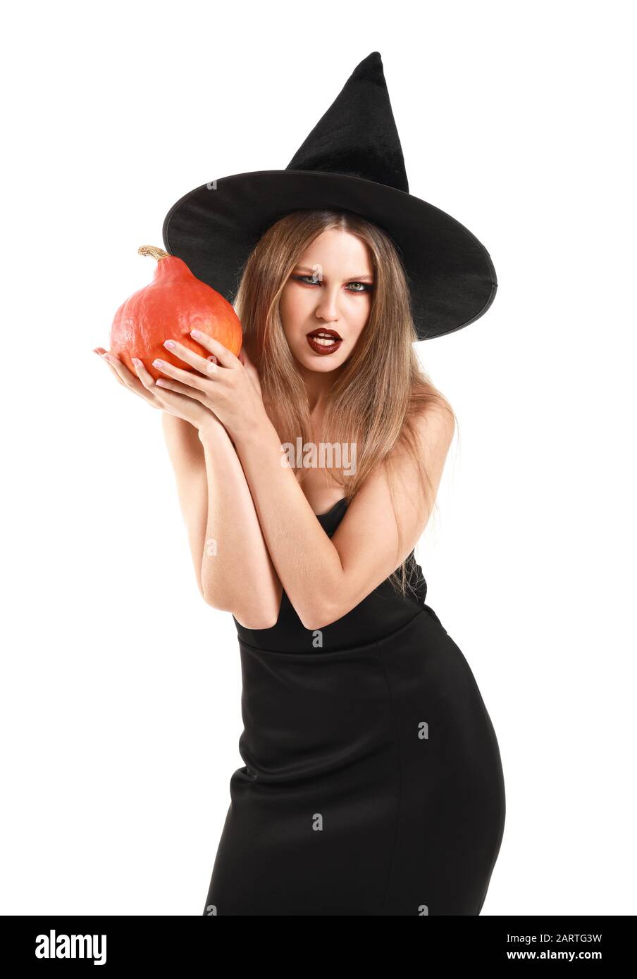 Beautiful woman dressed as witch for Halloween on white background ...