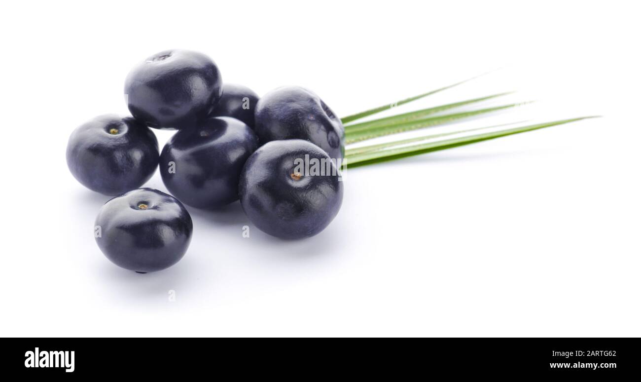Fresh acai berries on white background Stock Photo - Alamy