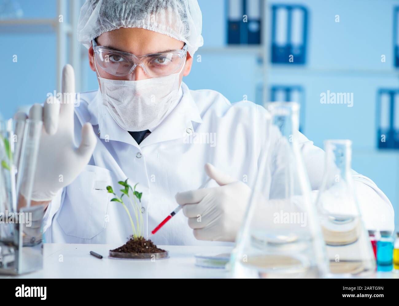 The male scientist researcher doing experiment in a laboratory Stock ...