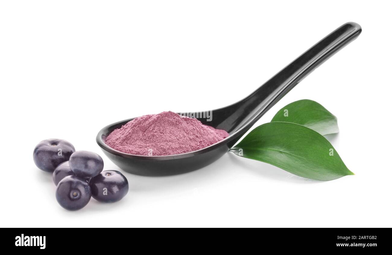 Spoon with acai powder on white background Stock Photo - Alamy