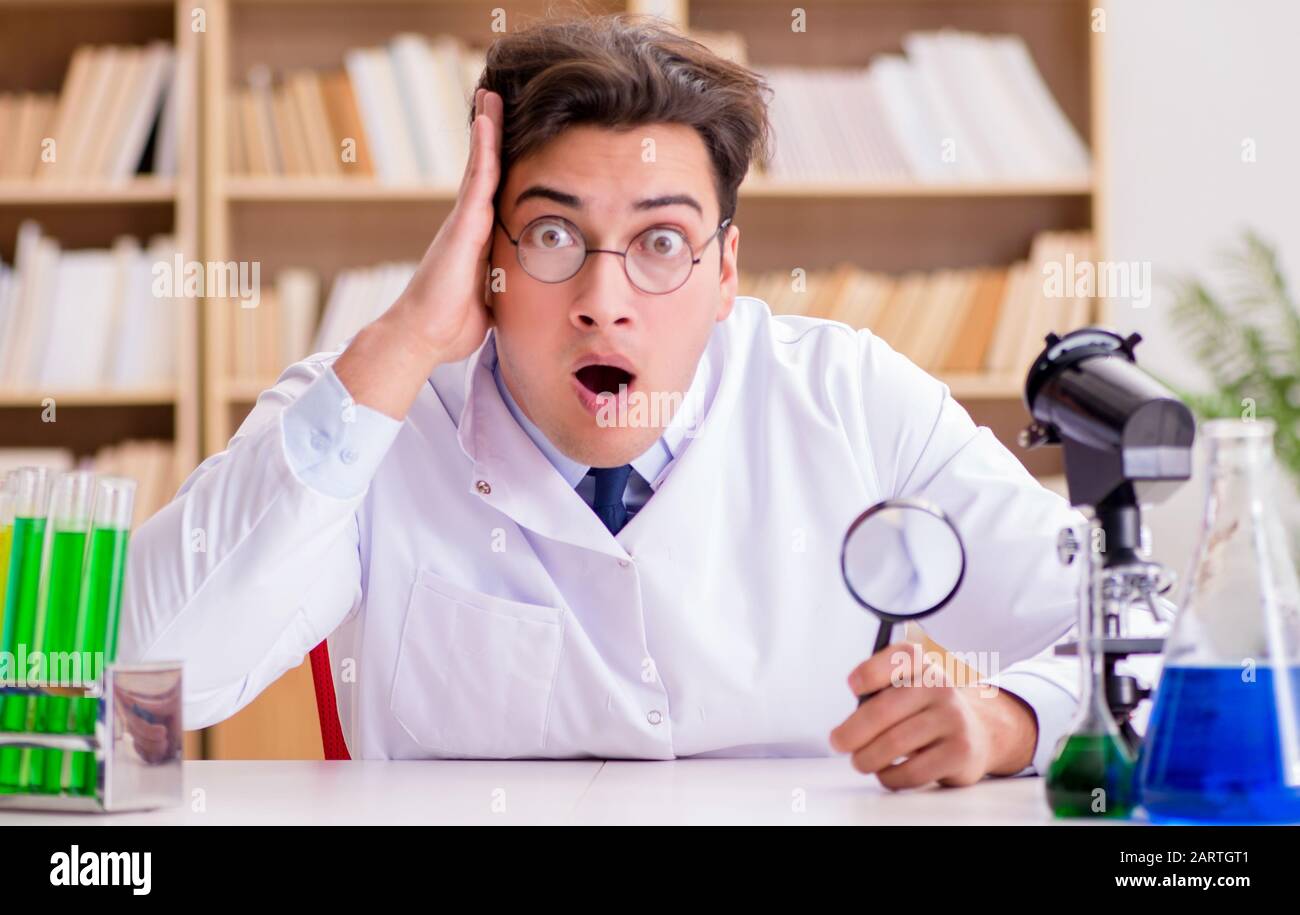 The mad crazy scientist doctor doing experiments in a laboratory Stock ...