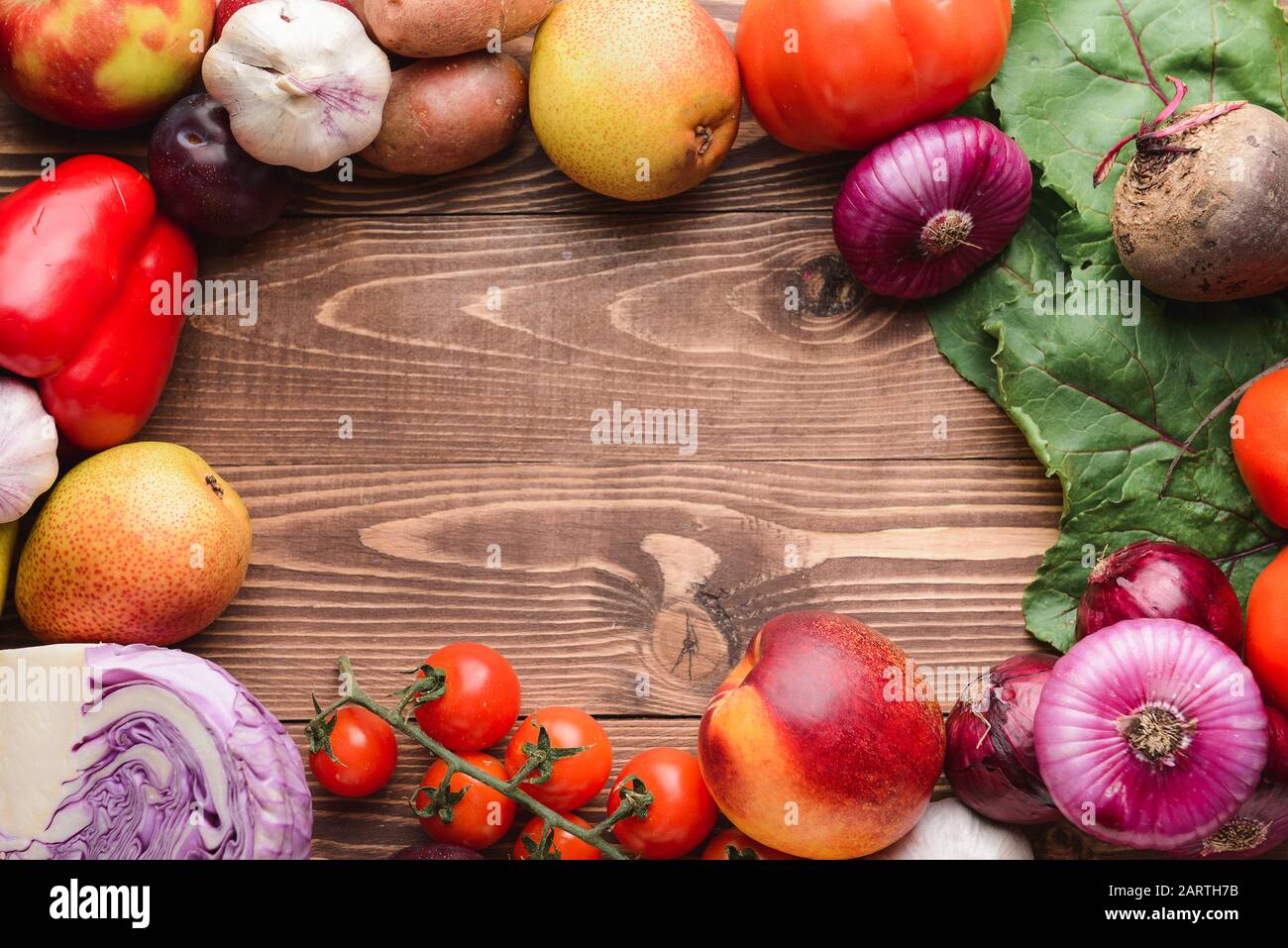 Frame made of healthy vegetables and fruits on wooden background Stock ...
